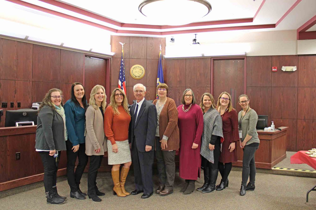 Honorable Judge Opat retires with a full courtroom